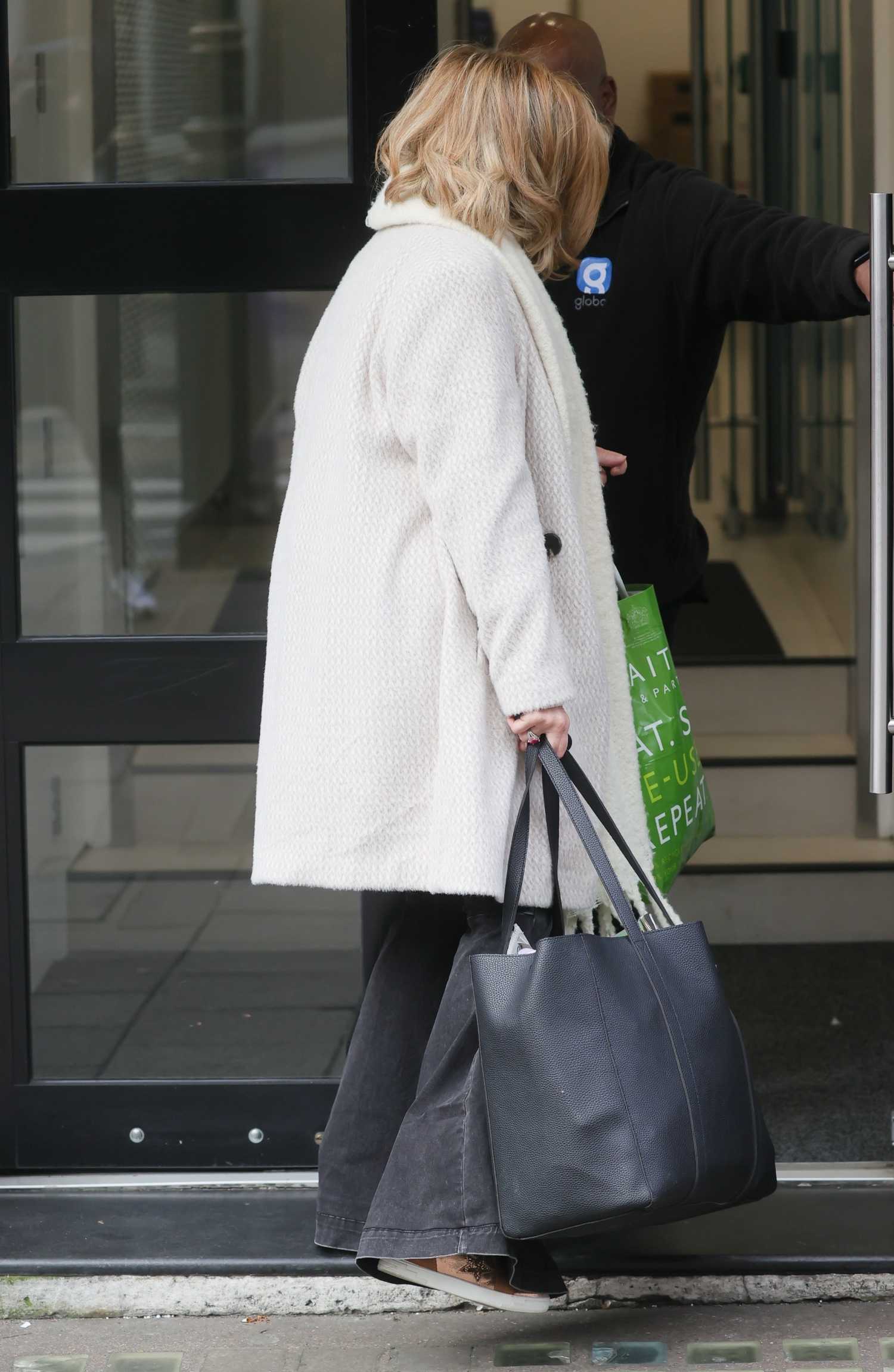 Kate Garraway in a White Turtleneck Arrives at Global Studios Smooth FM ...