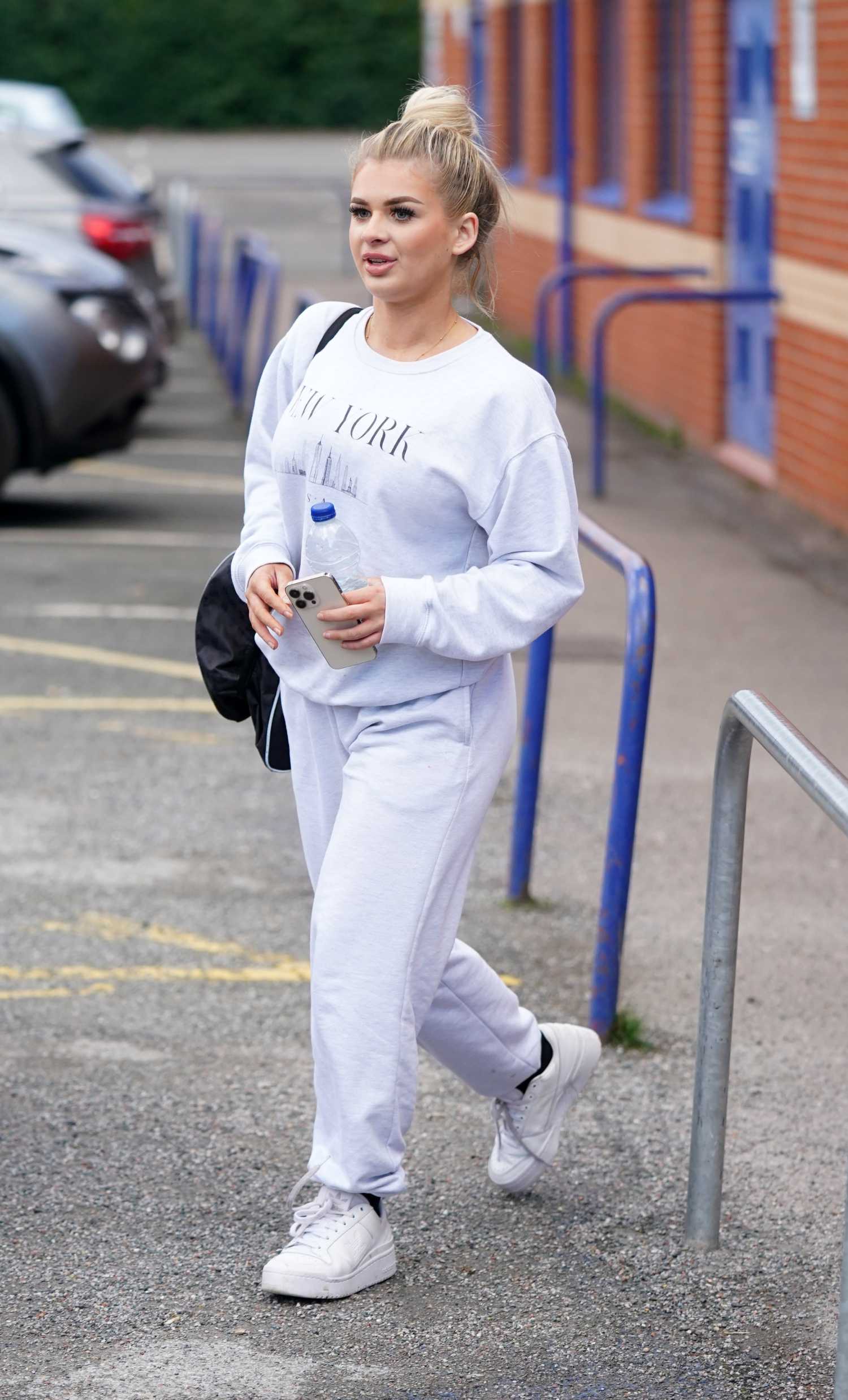 Liberty Poole in a White Sneakers Leaves a Dancing on Ice Training ...