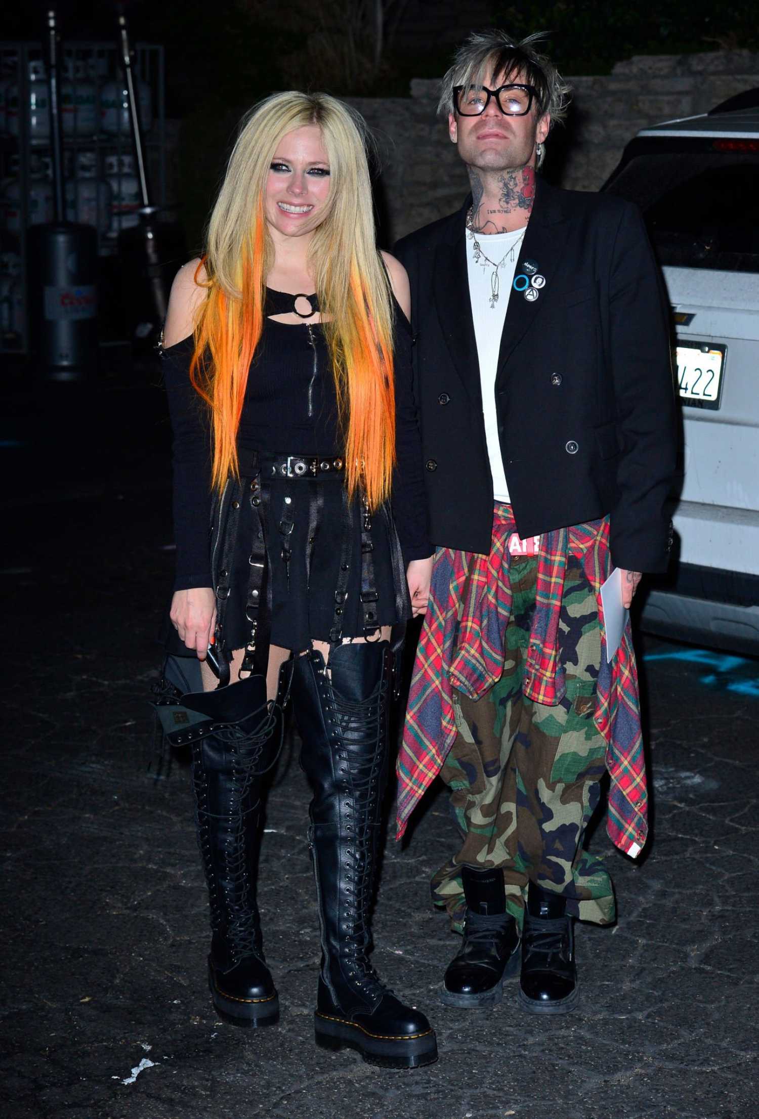 Avril Lavigne in a Black Mini Skirt Has Dinner with Mod Sun at BOA ...