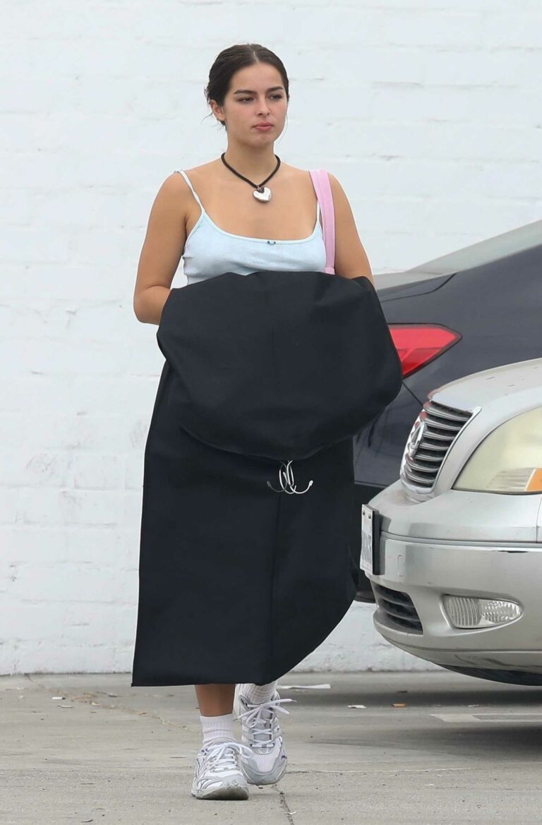 Addison Rae in a White Mini Dress Goes Shopping at Dover Street Market ...