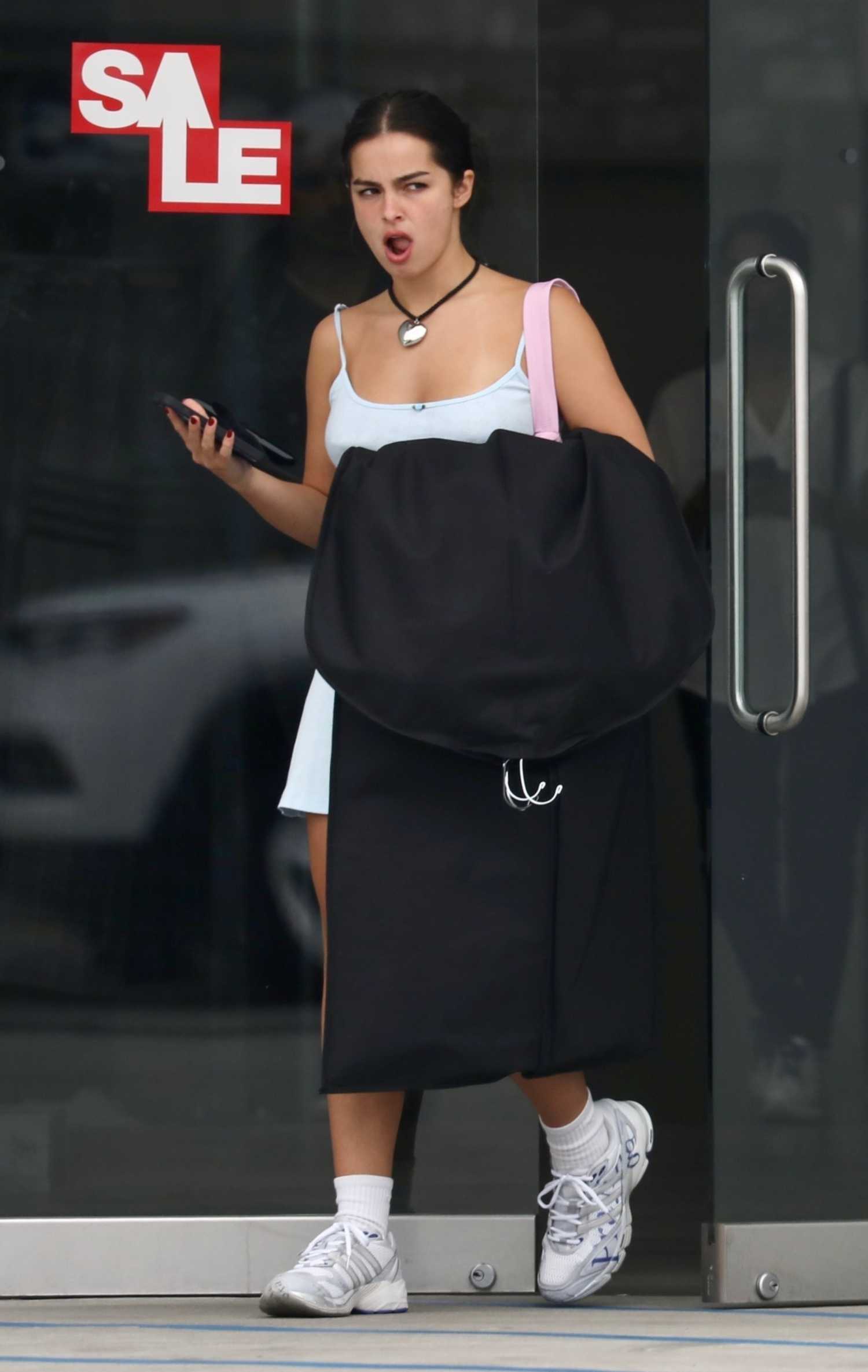 Addison Rae in a White Mini Dress Goes Shopping at Dover Street Market ...