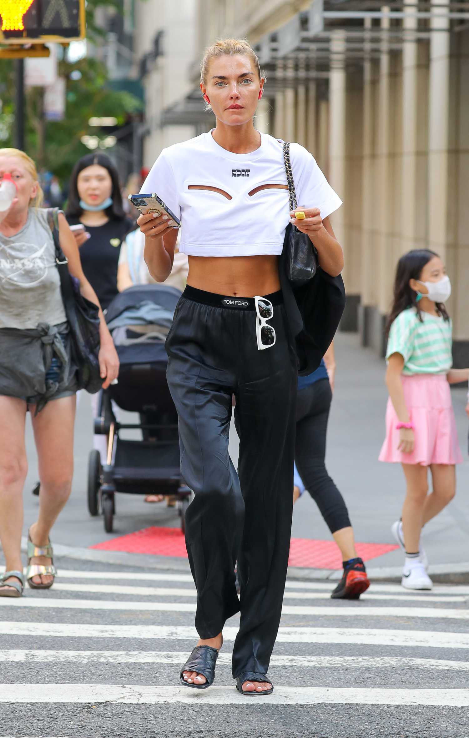 Alina Baikova in a White Cropped Tee Was Spotted Smoking Her Vape ...