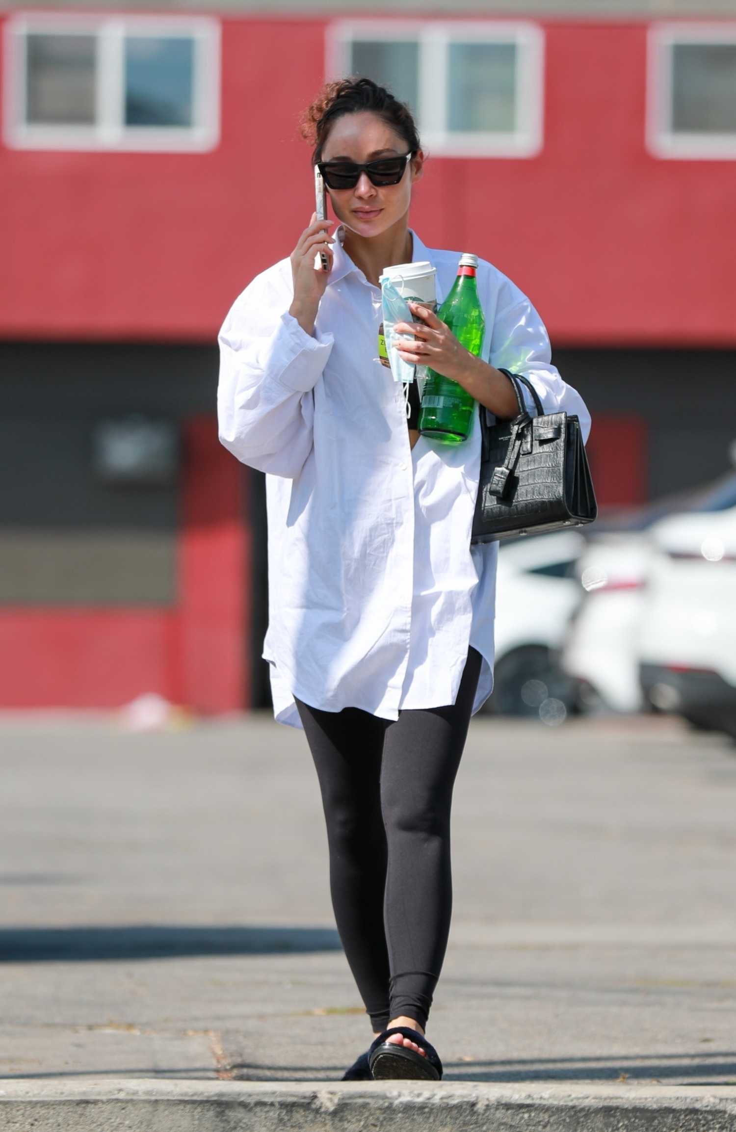 Cara Santana in a White Shirt Arrives to a Morning Pilates Class in ...
