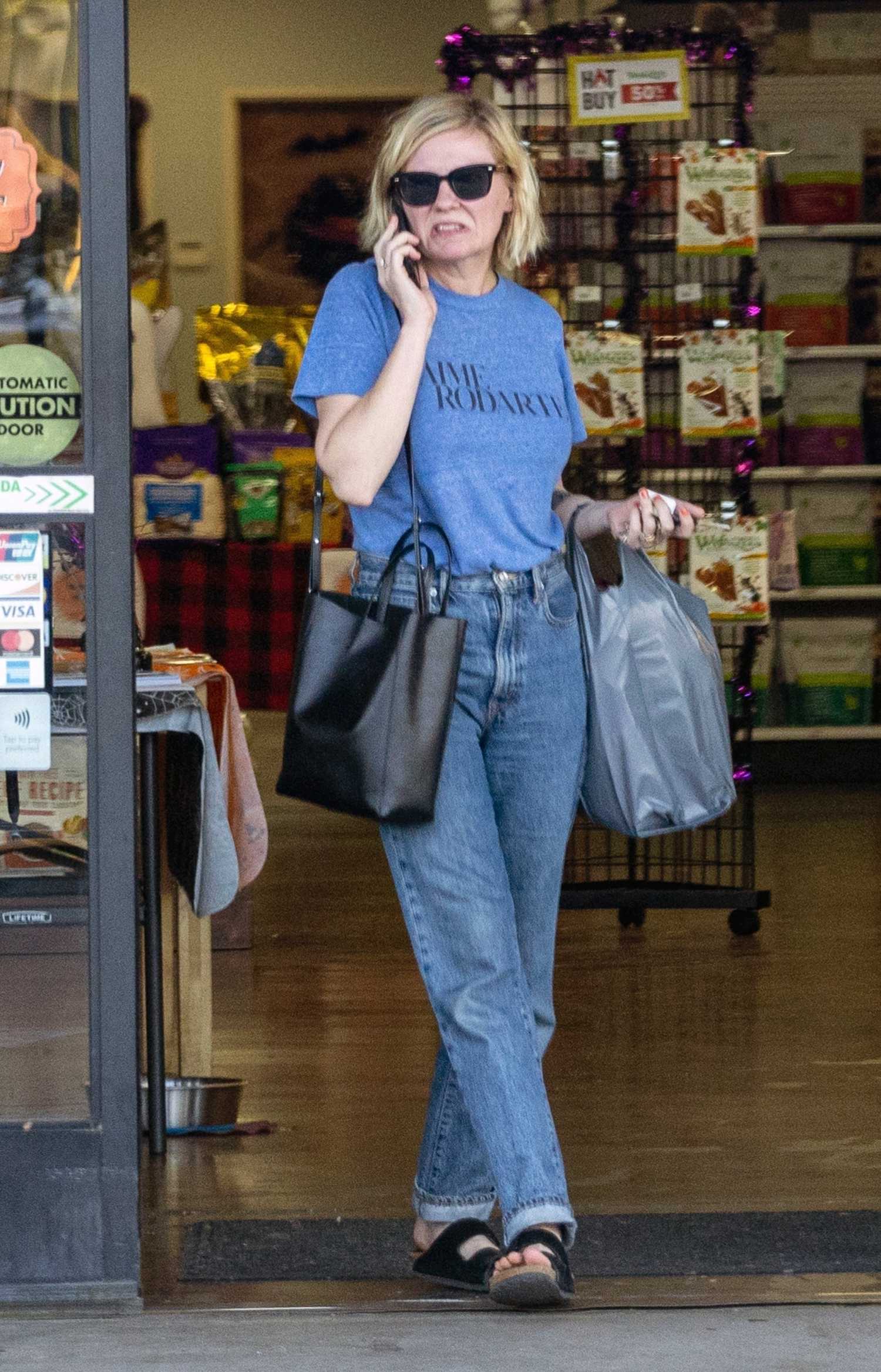 Kirsten Dunst in a Blue Tee Gets Some Shopping Done in Burbank – Celeb ...
