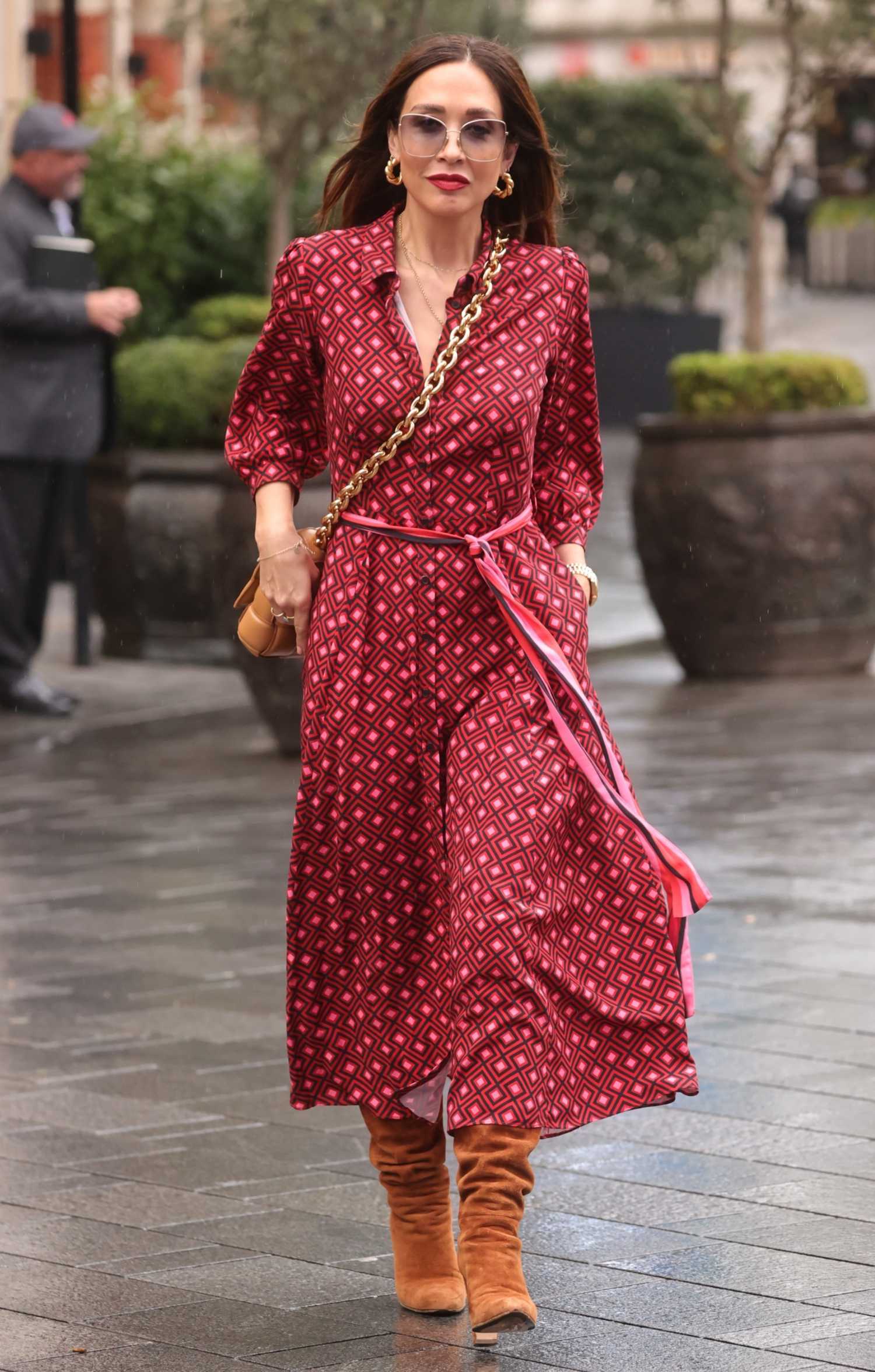 Myleene Klass in a Red Patterned Dress Leaves the Global Radio in ...