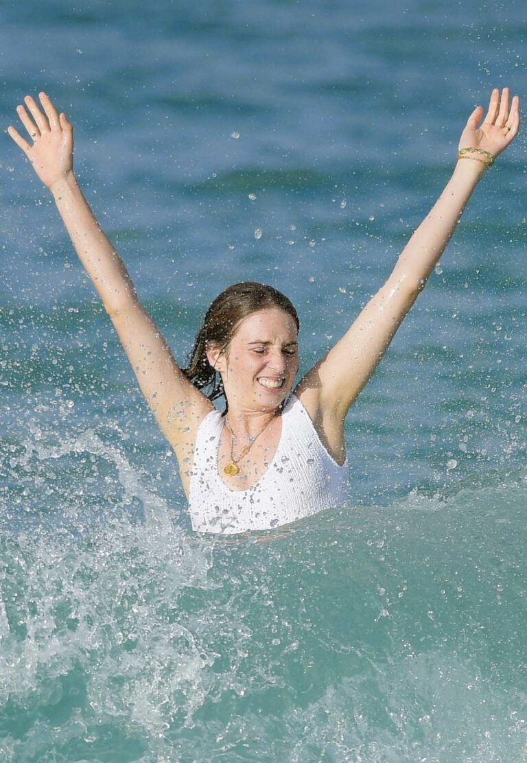 Maya Hawke in a White Swimsuit on the Beach in St. Barths – Celeb Donut