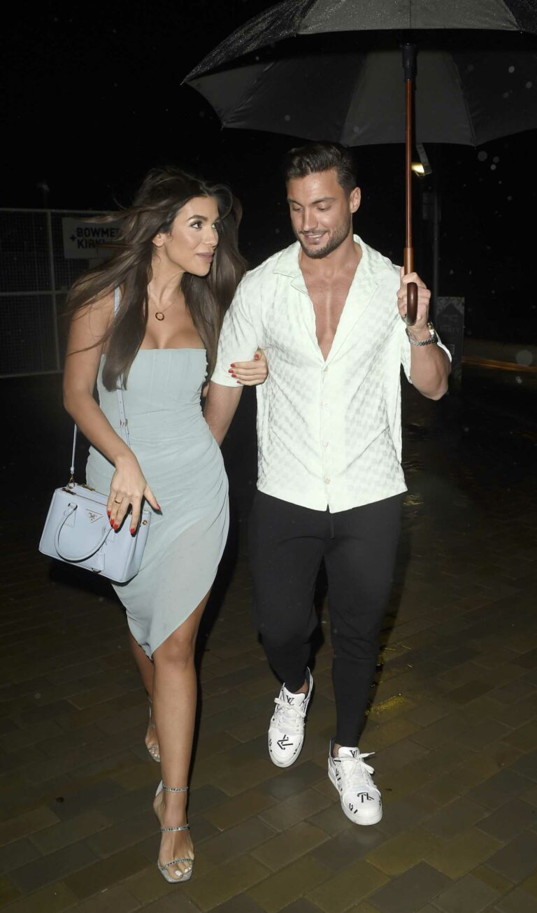 Ekin-Su Cülcüloğlu in a Baby Blue Dress in the Rain on New Year Date ...