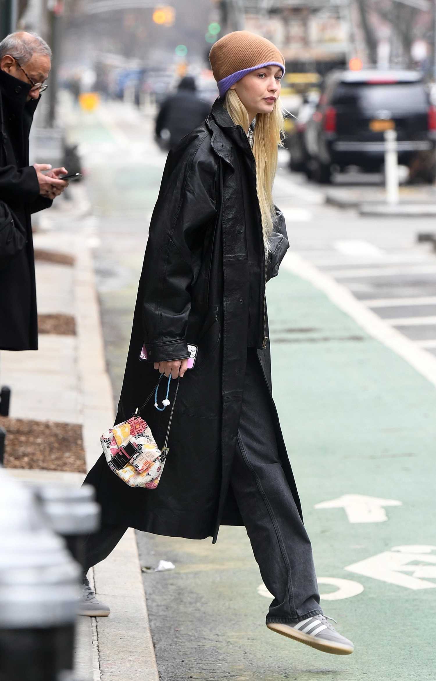Gigi Hadid in a Black Leather Trench Coat Was Seen Out in New York ...