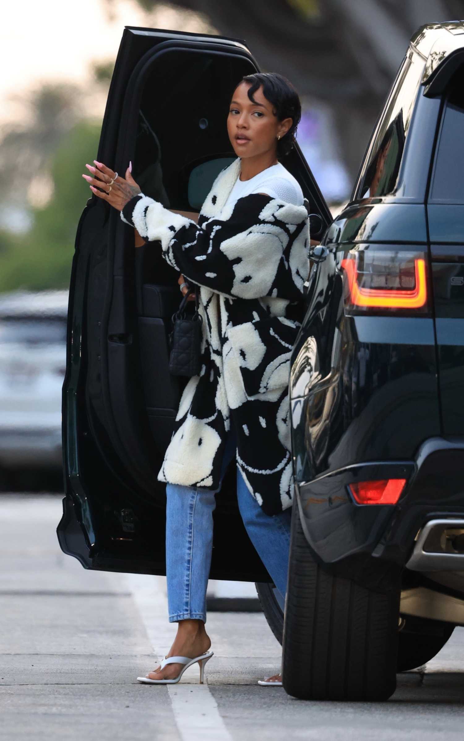Karrueche Tran in a Smile Print Bathrobe Heads to Dinner at Mr Chow in ...