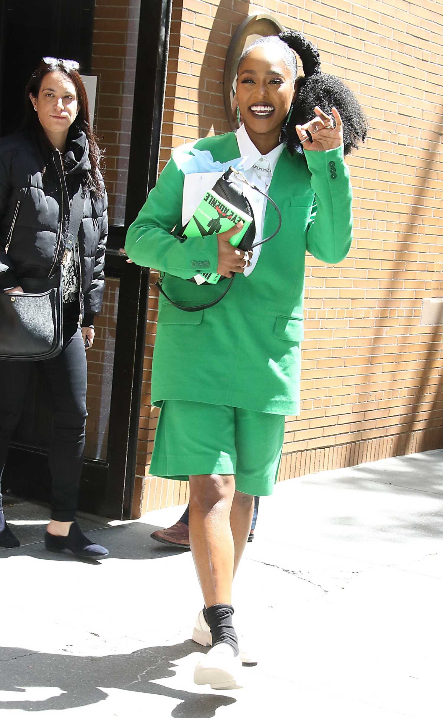 Arsema Thomas in a Green Ensemble Leaves The View in New York City ...