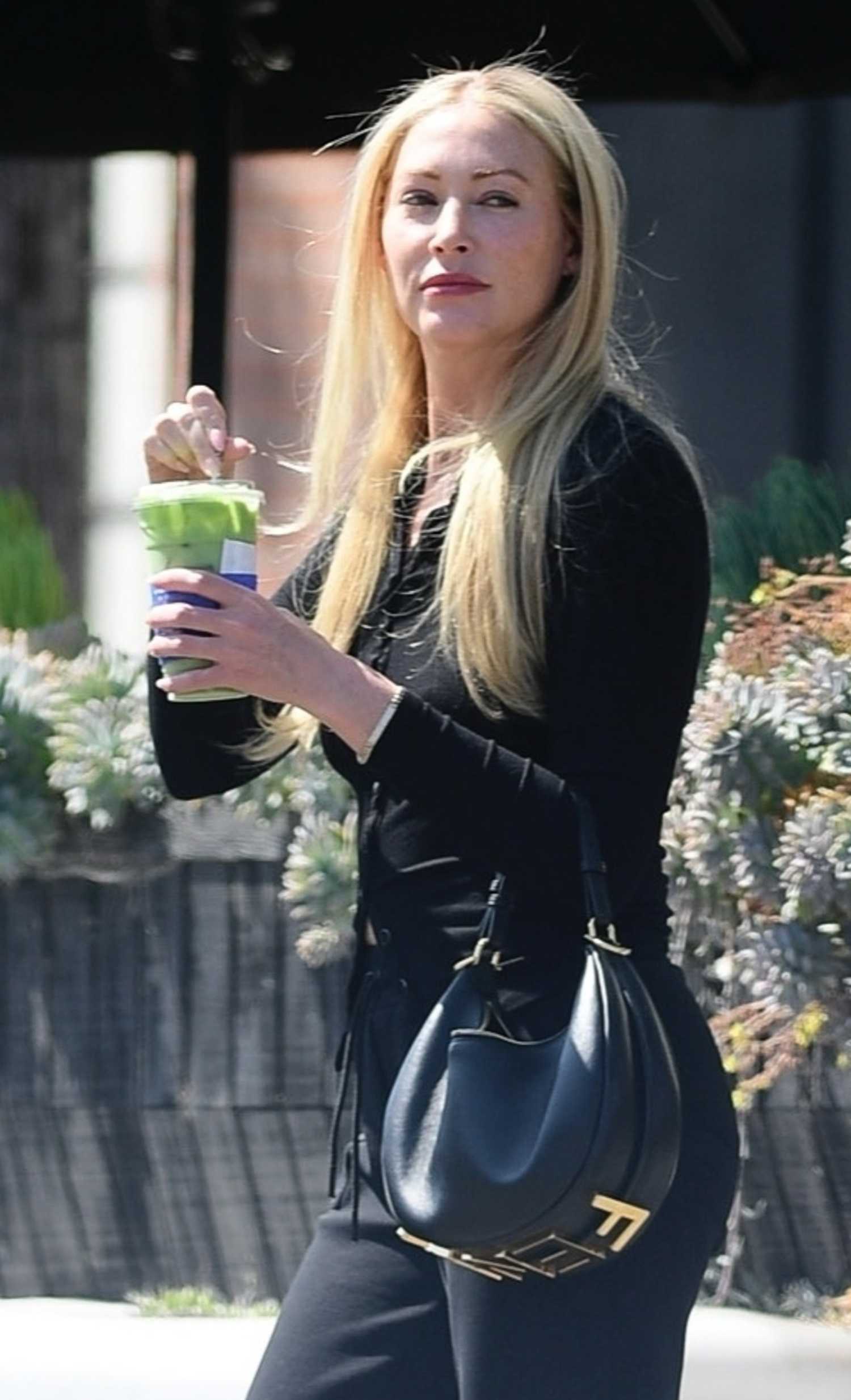 Julie Mintz in a Black Sweatpants Exits a Coffee Shop in Los Angeles ...