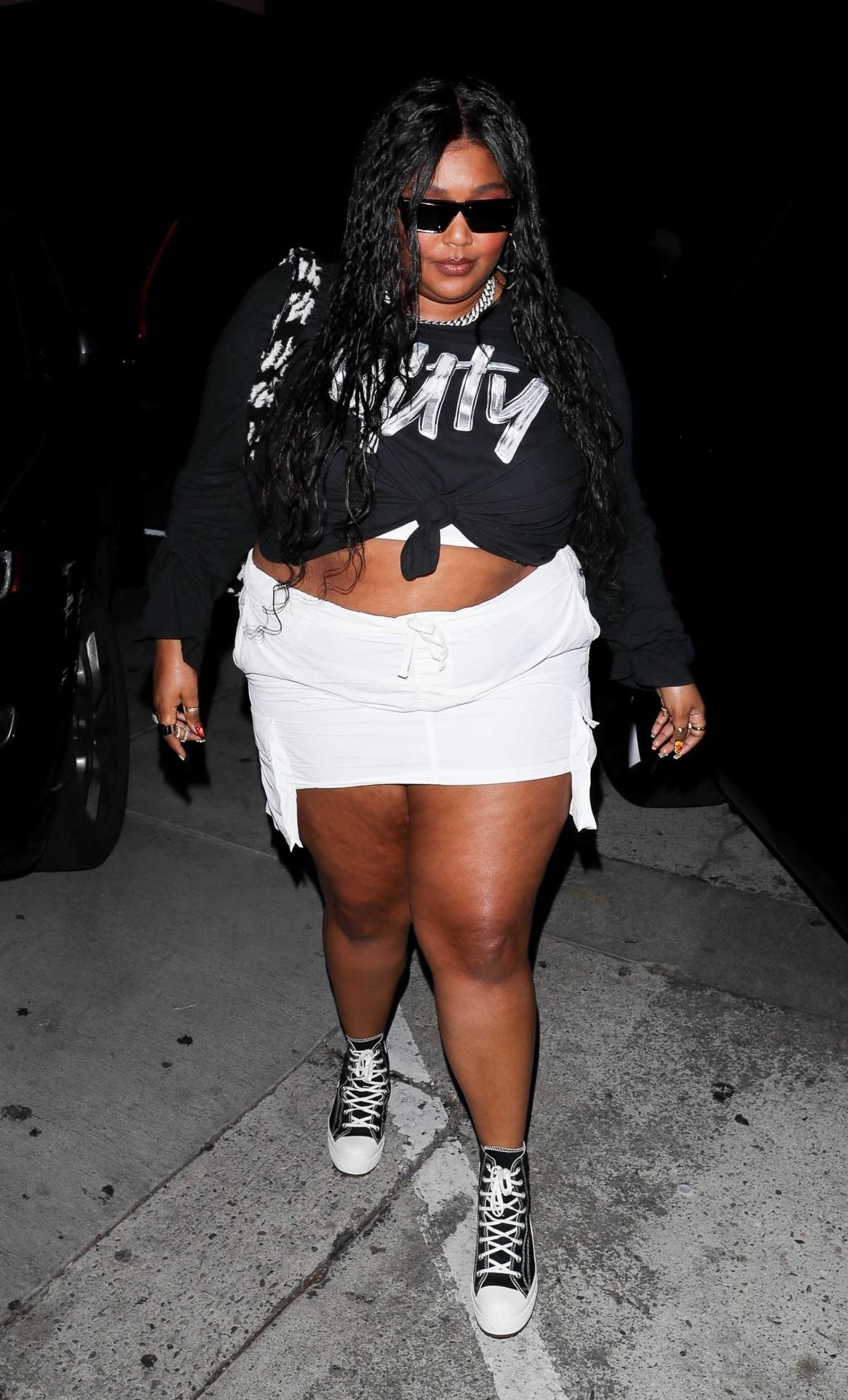 Lizzo in a White Mini Skirt Arrives at Craig’s for a Late-Night Dinner ...