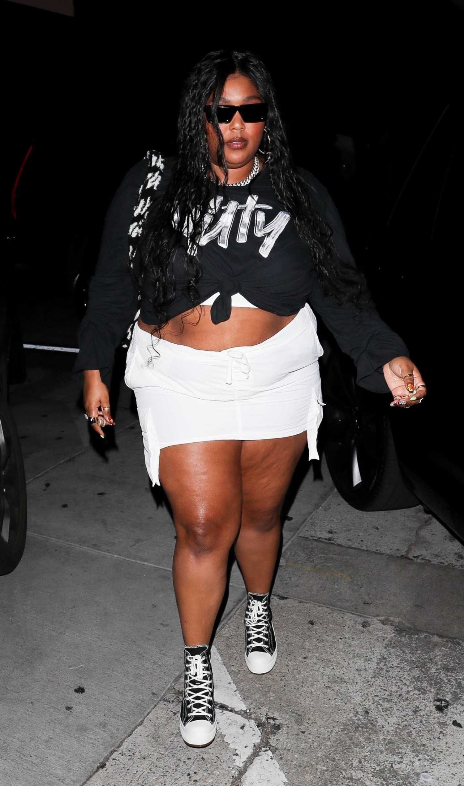 Lizzo in a White Mini Skirt Arrives at Craig’s for a Late-Night Dinner ...