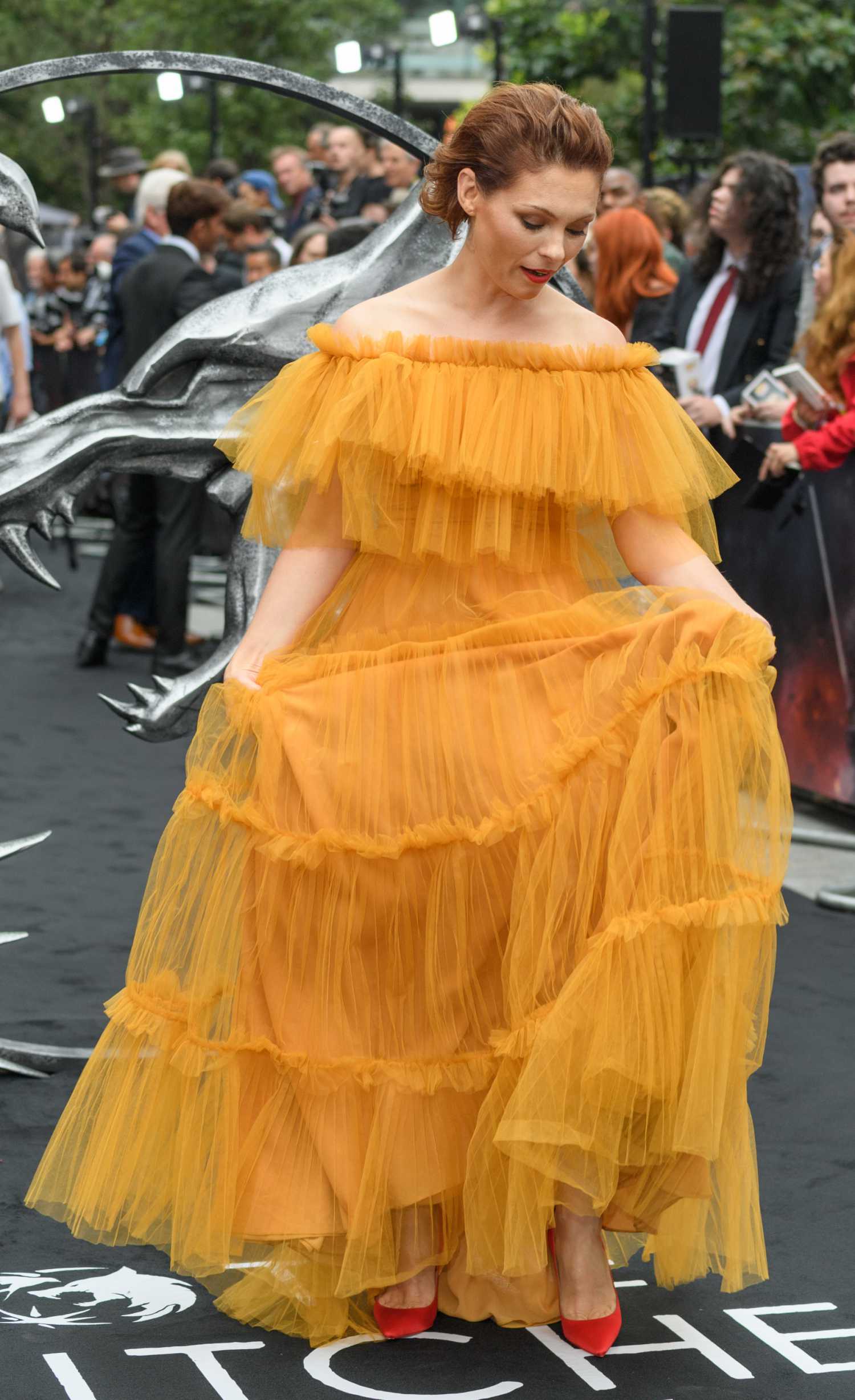 MyAnna Buring in a Yellow Dress Arrives at The Witche” UK Premiere at ...