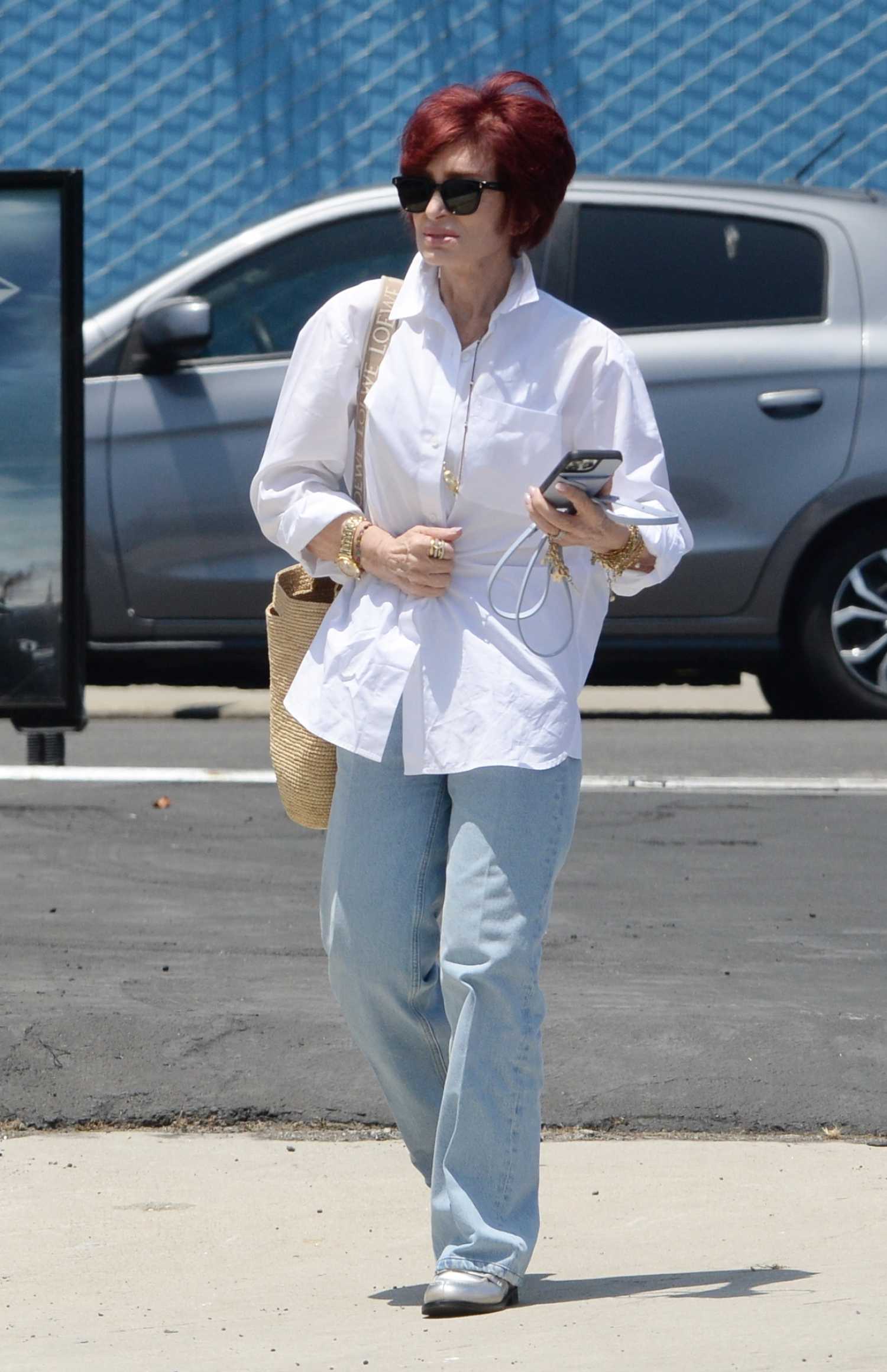 Sharon Osbourne in a White Shirt Sights of a Titanic Exhibit in Los ...