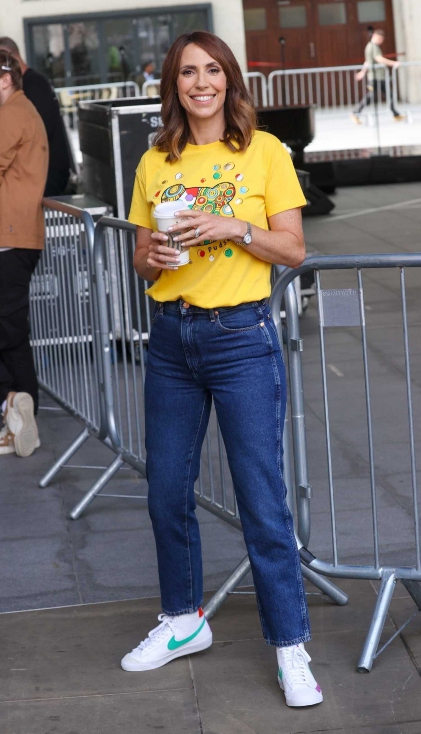 Alex Jones in a Yellow Tee Steps Out of the BBC Studios in London ...