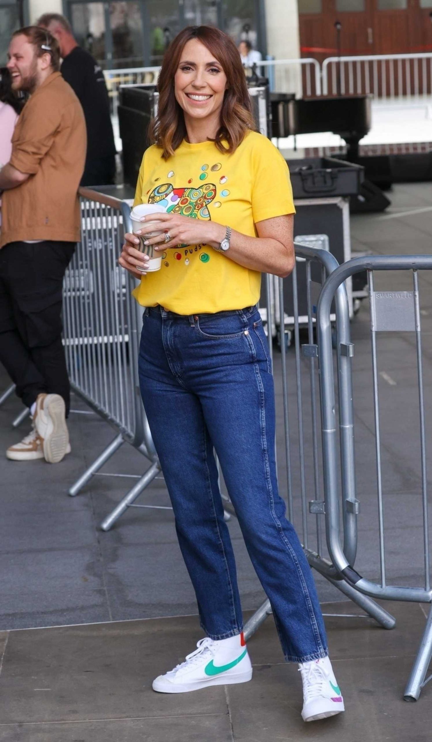 Alex Jones in a Yellow Tee Steps Out of the BBC Studios in London ...