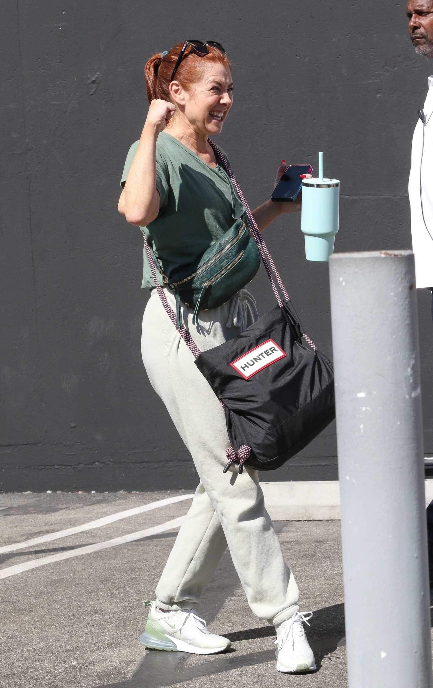 Alyson Hannigan in an Olive Tee Leaves Her Practice at the Dancing with the Stars Rehearsal ...