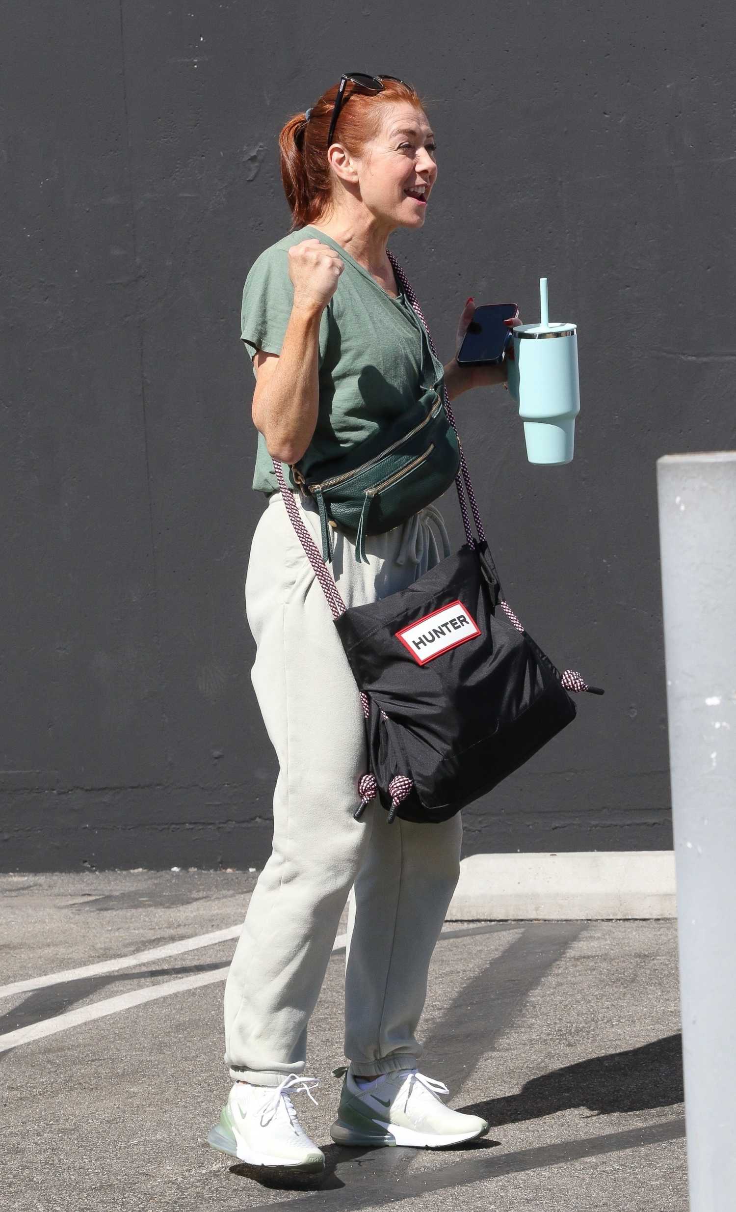 Alyson Hannigan in an Olive Tee Leaves Her Practice at the Dancing with the Stars Rehearsal ...