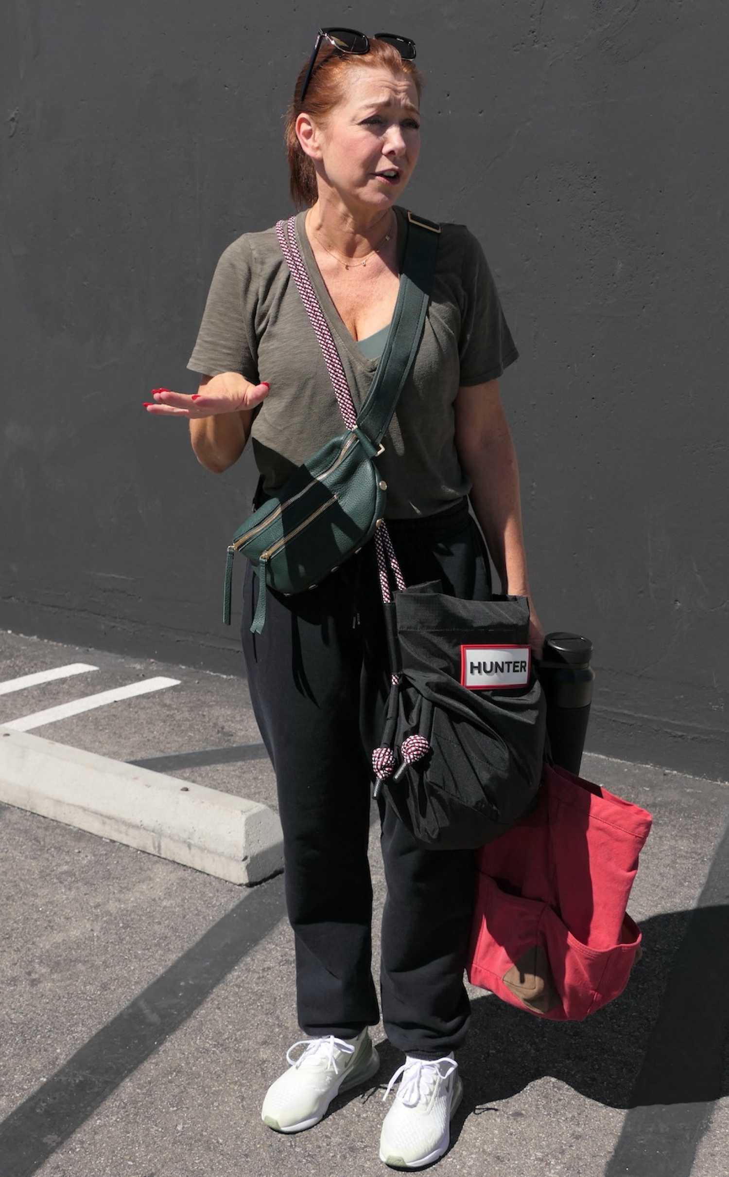 Alyson Hannigan in an Olive Tee Leaves the Dancing With the Stars Rehearsals in Los Angeles ...